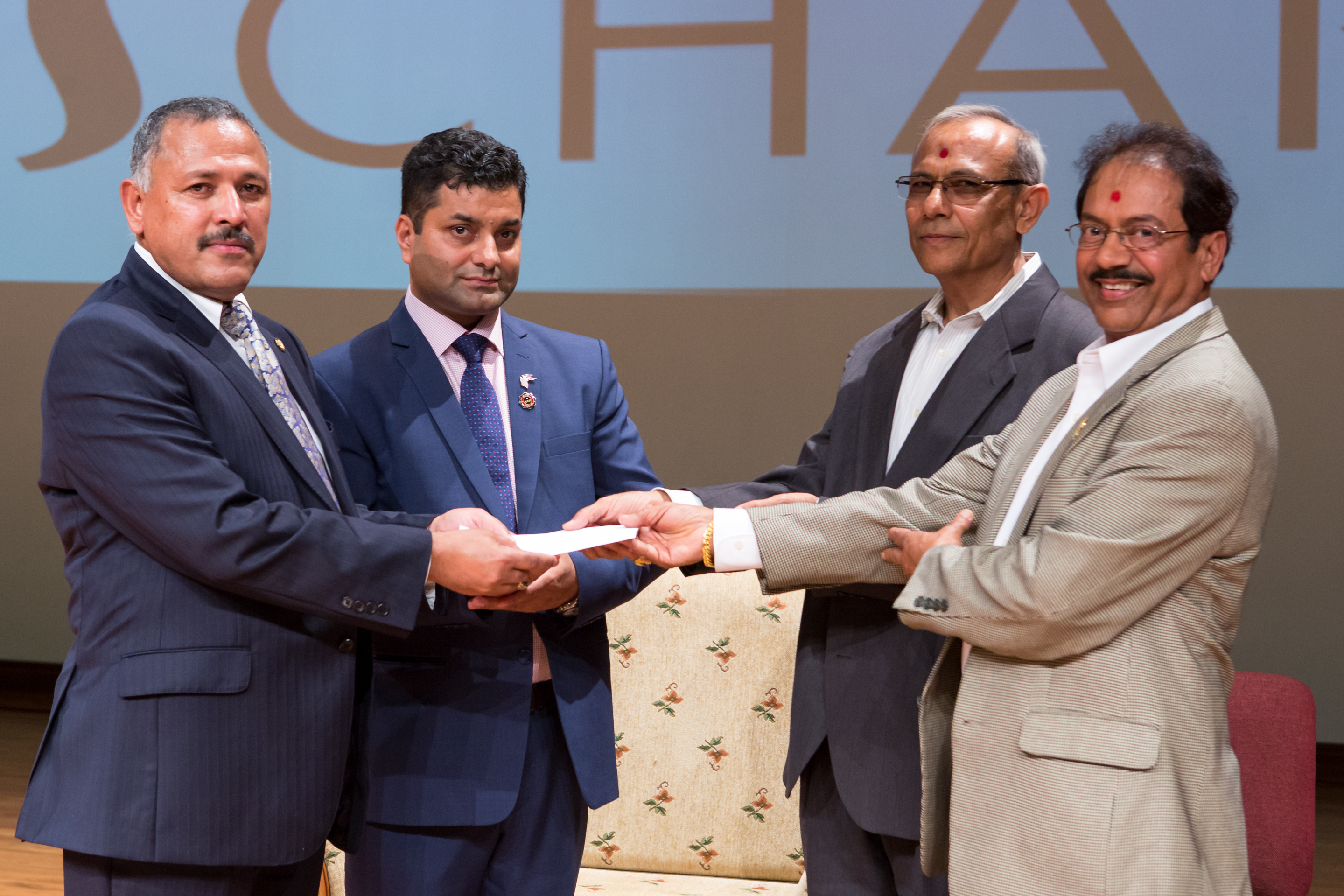 BAPS Charities donates $25,000 to the Embassy of Nepal in USA • BAPS ...